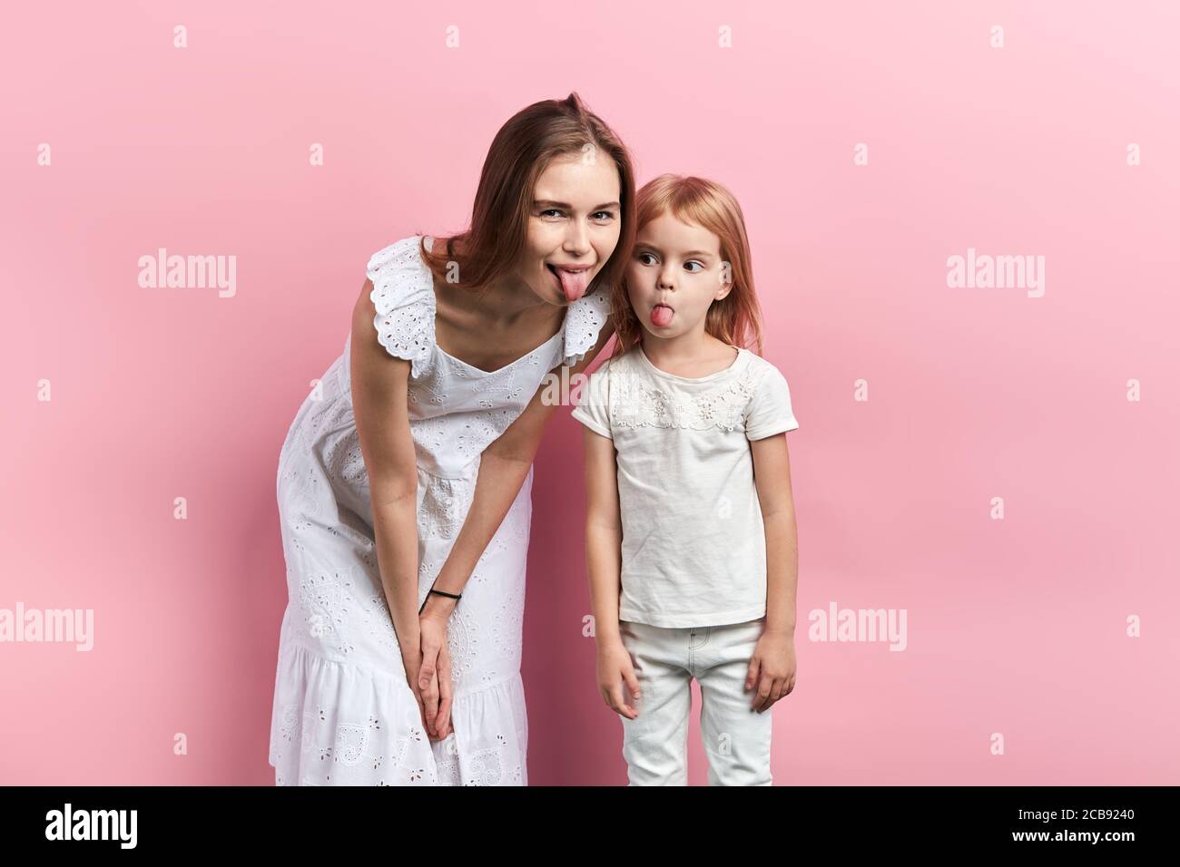 Close up portrait of careless pretty joyful funny mother and her ...