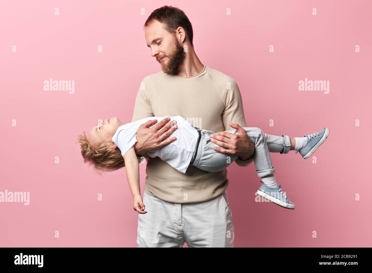Pleasant Handsome Man Spending Time With His Son Close Up Photo Stock