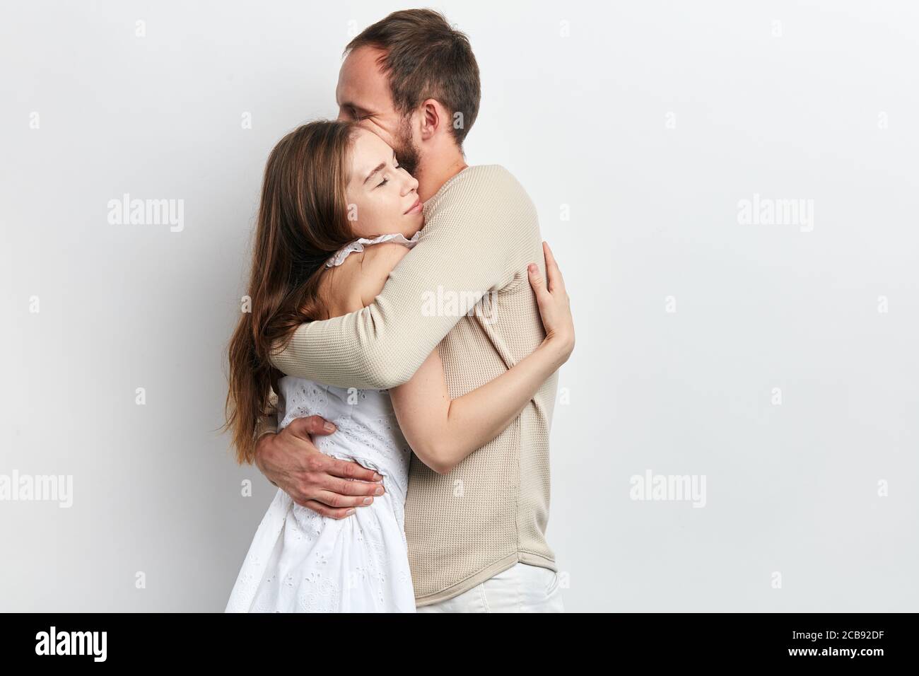 loving couple embracing , expressing warm, tender feeling, tenderness ...