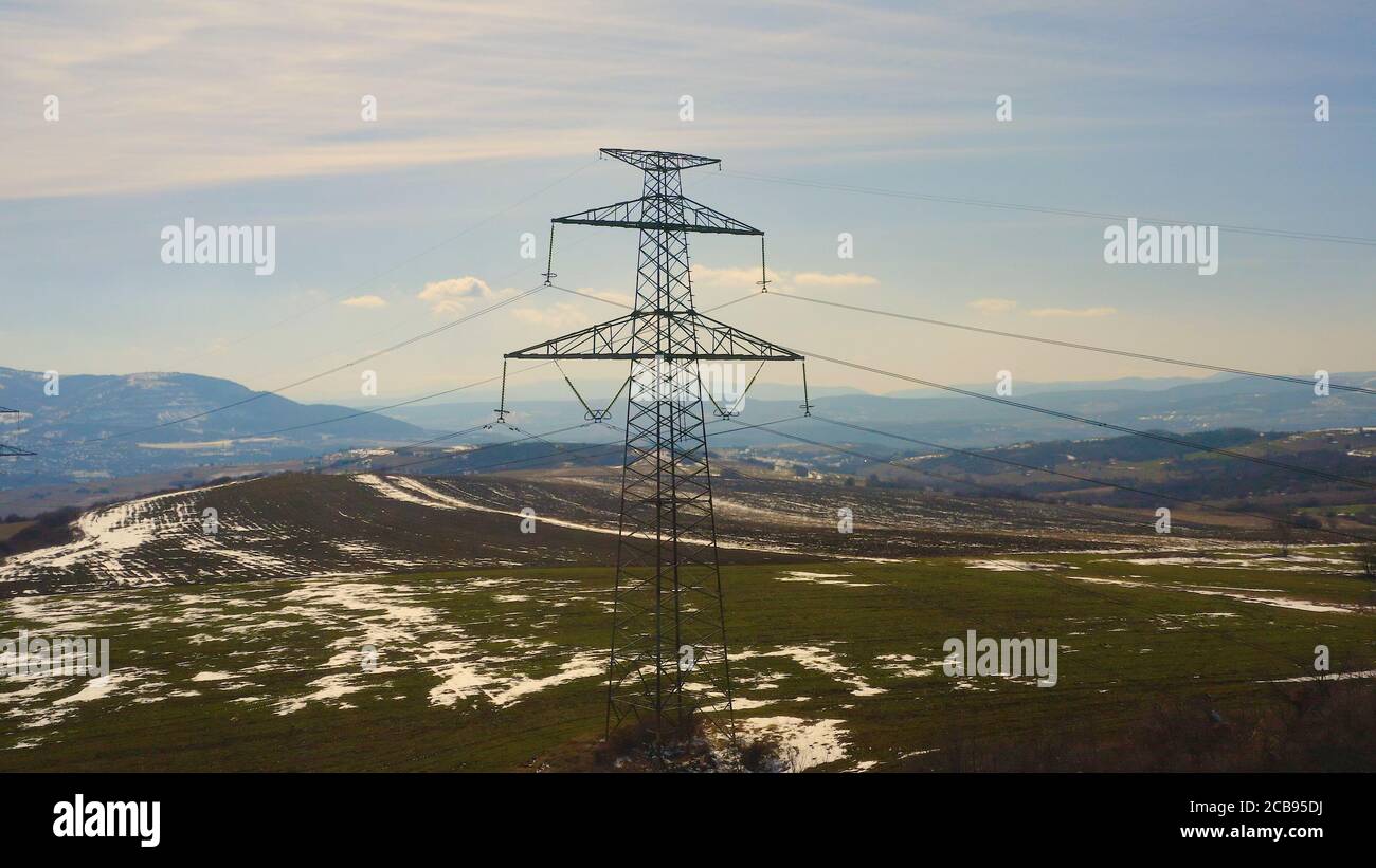 Aerial shot of a power transmission tower and hills Stock Photo - Alamy
