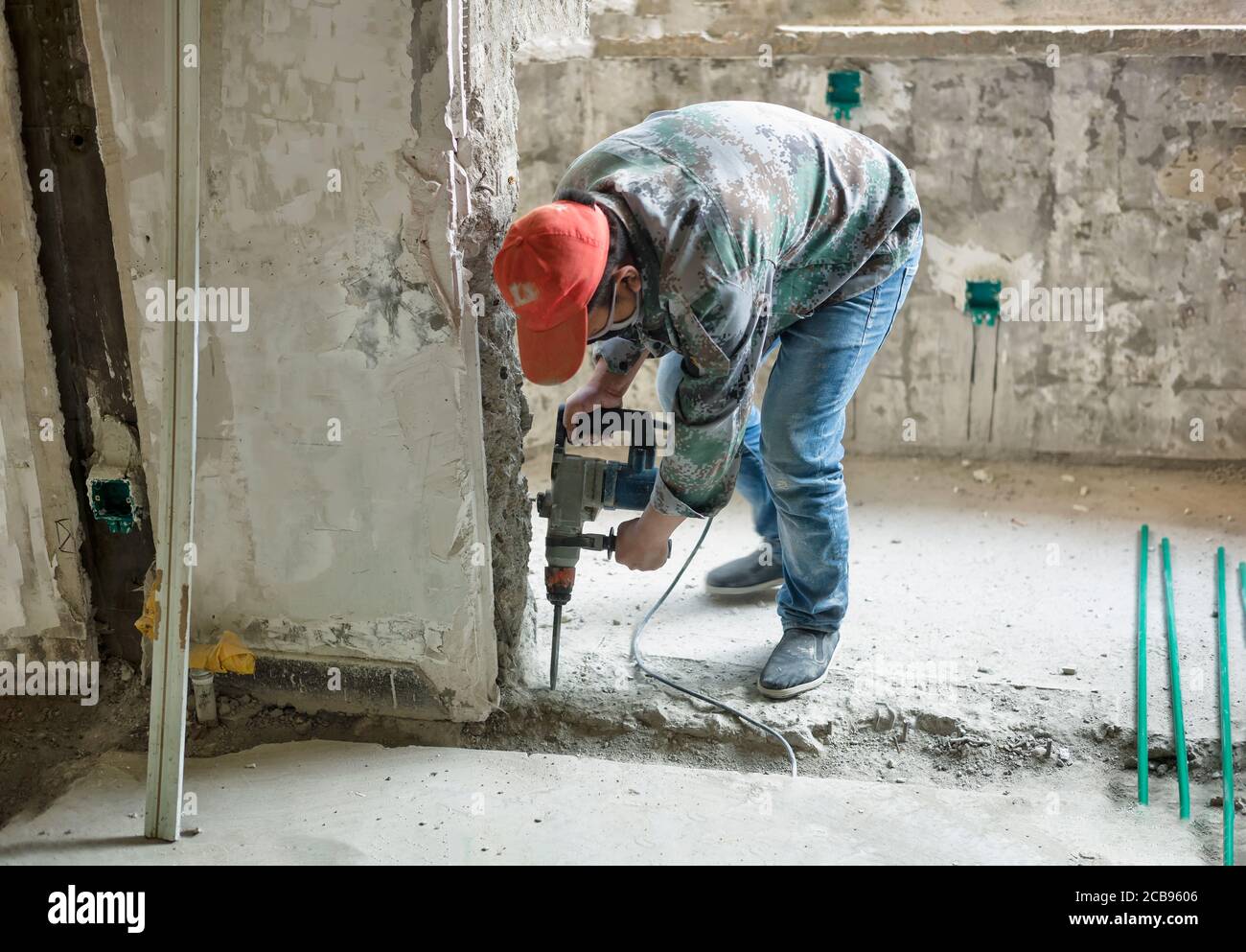 construction worker working on interior decoration Stock Photo - Alamy