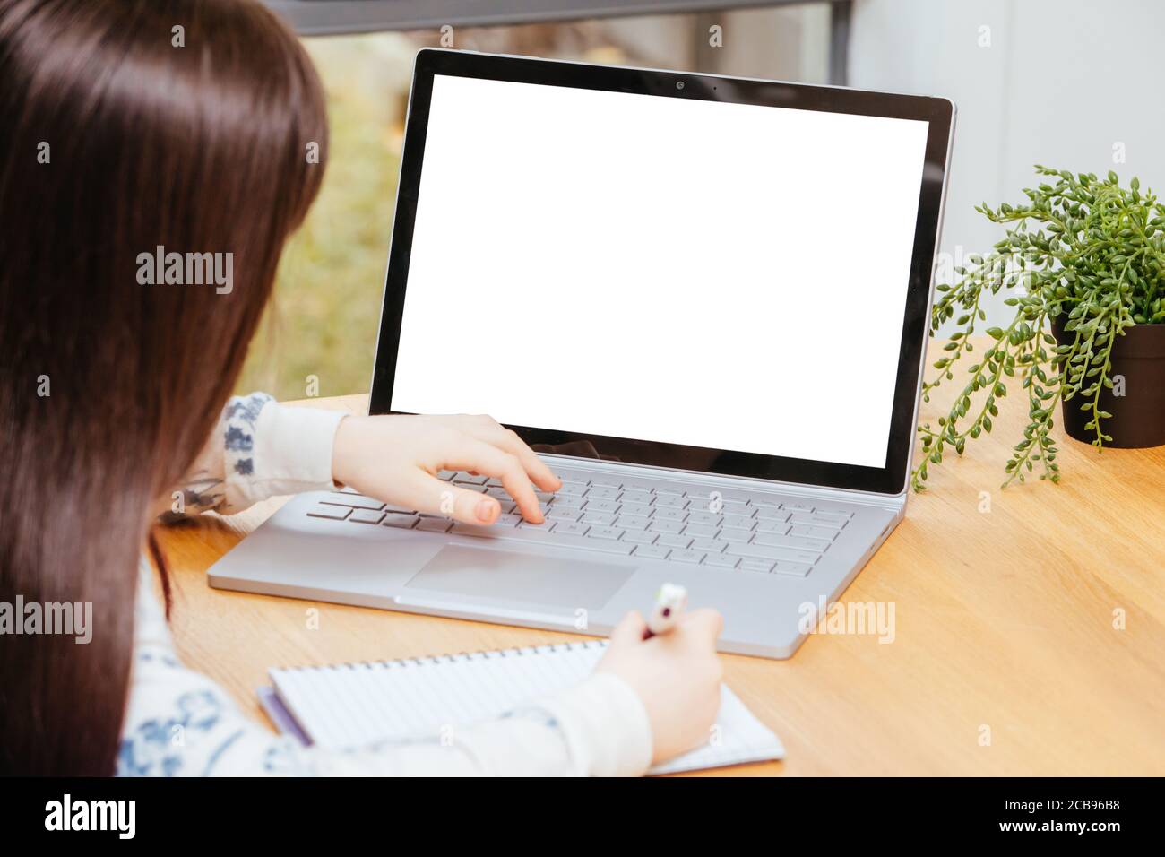 Child Uses a Computer for School Work Stock Photo - Alamy