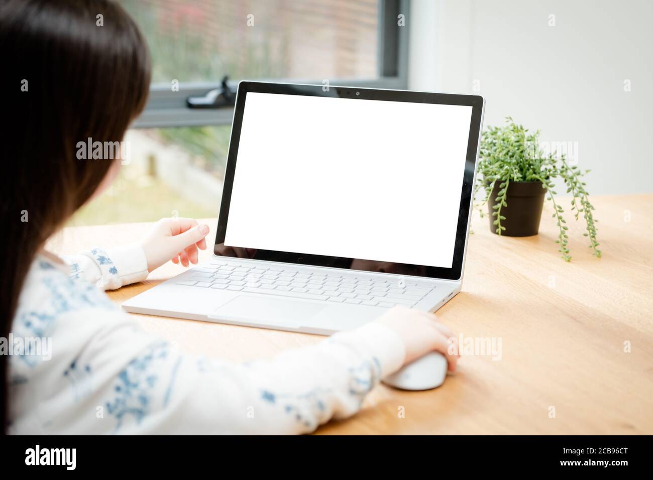 Child Uses a Computer for School Work Stock Photo - Alamy