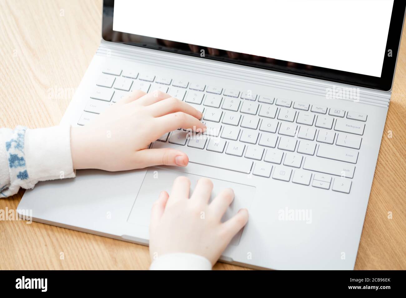 Child Uses a Computer for School Work Stock Photo - Alamy