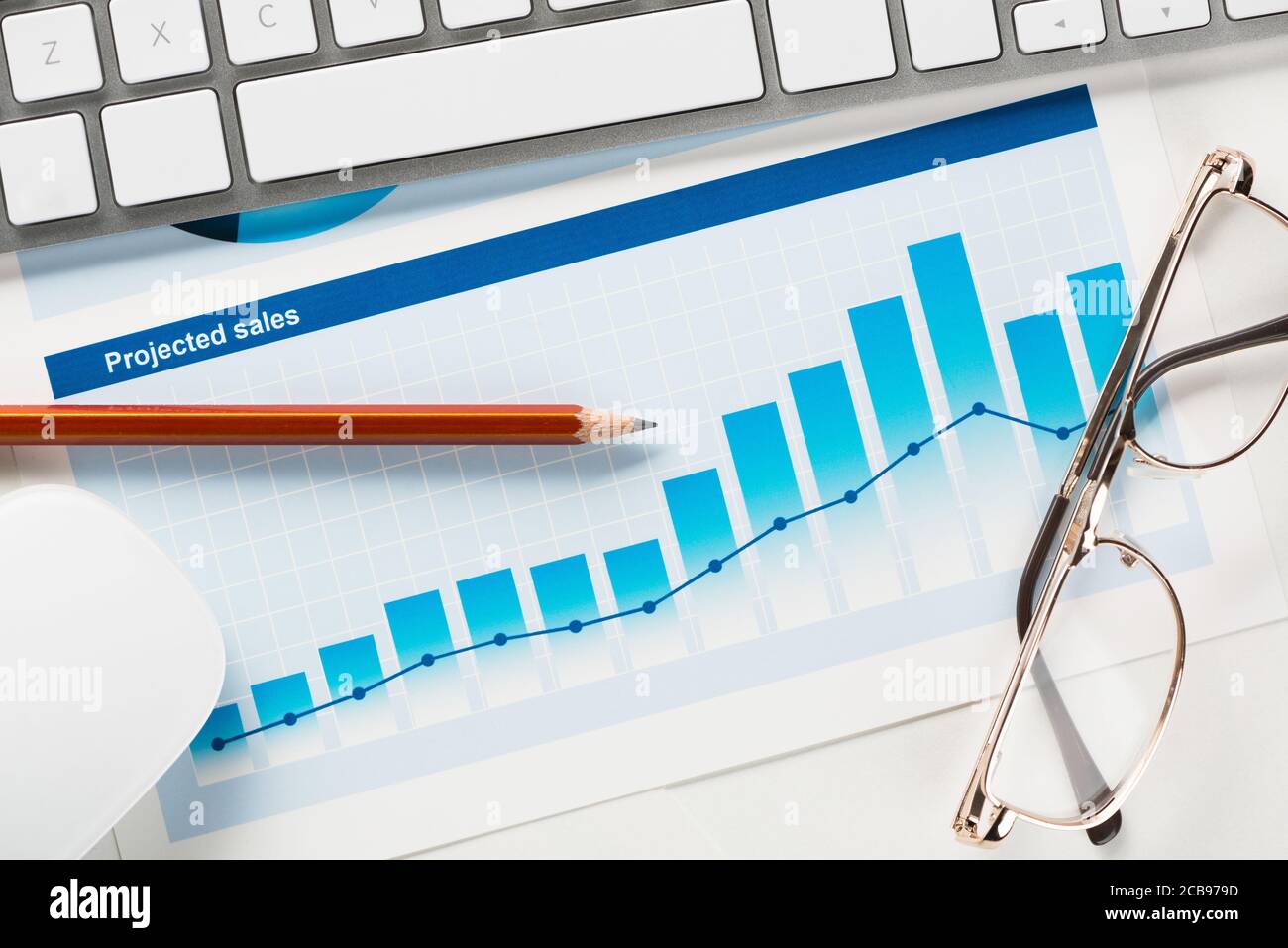 Preparing average sales report Stock Photo - Alamy