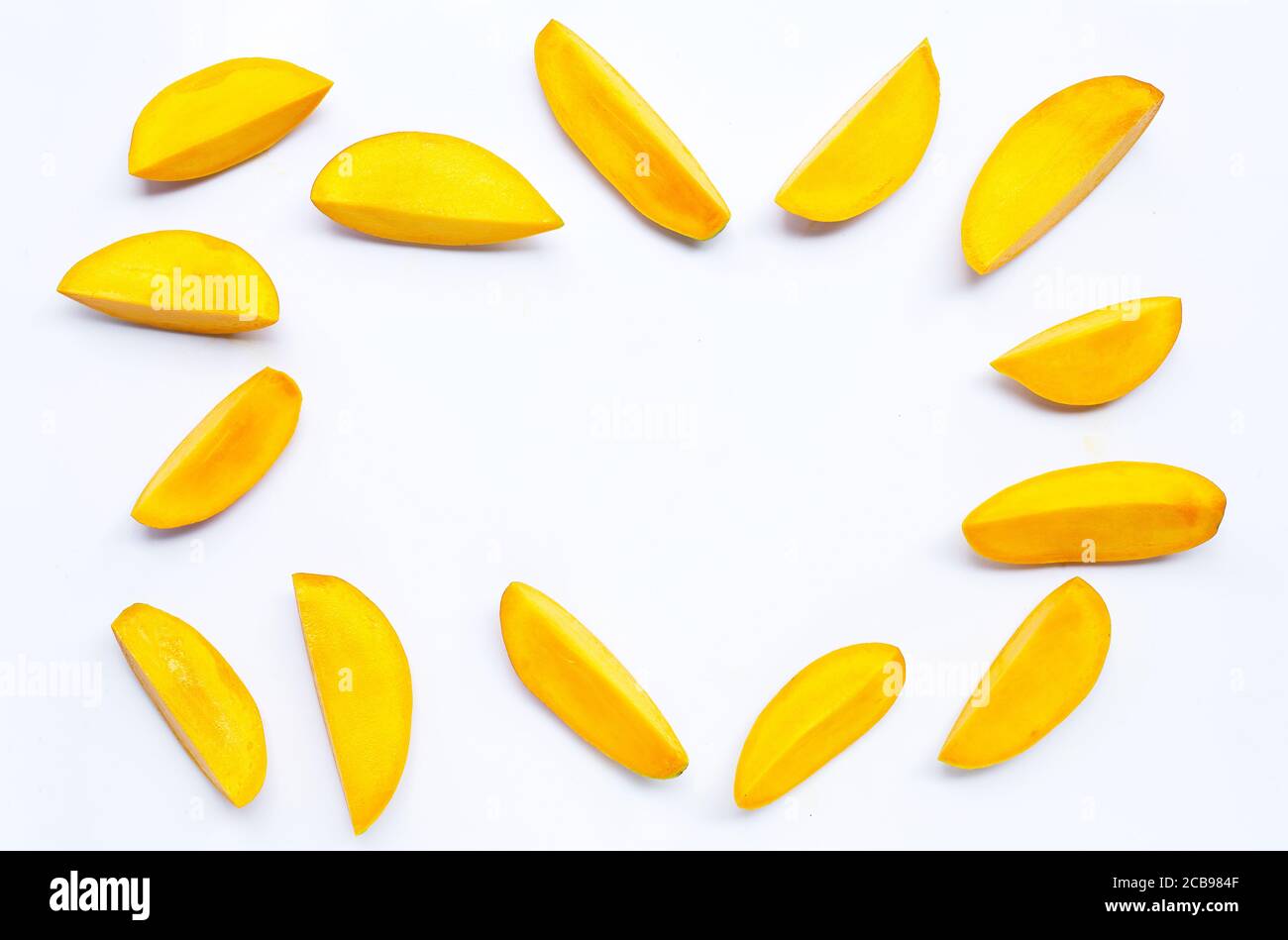 Tropical fruit, Frame made of mango on white background. Copy space ...