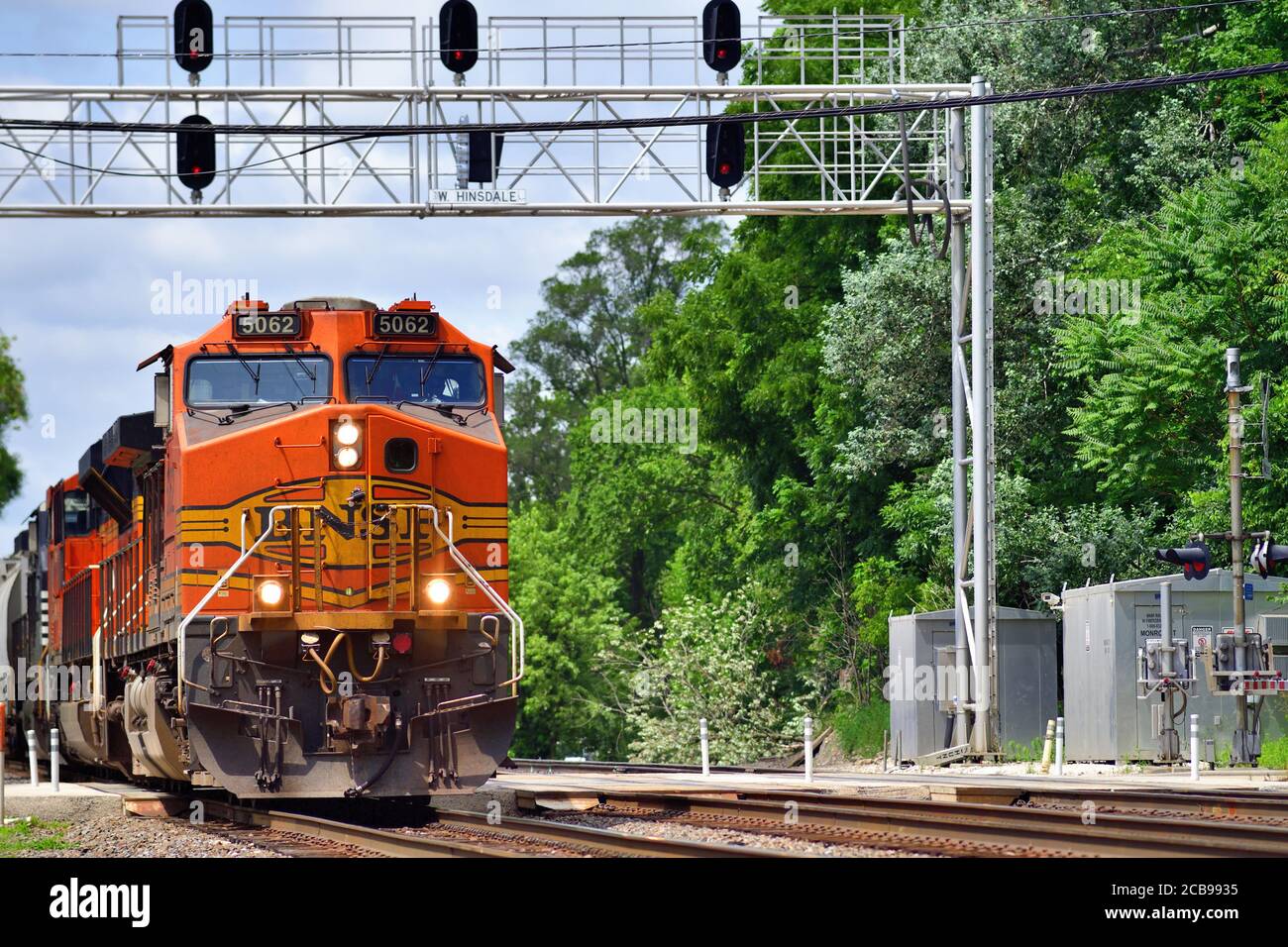 Hinsdale, Illinois, USA. A pair of locomotives lead a Burlington Northern Santa Fe manifest ...