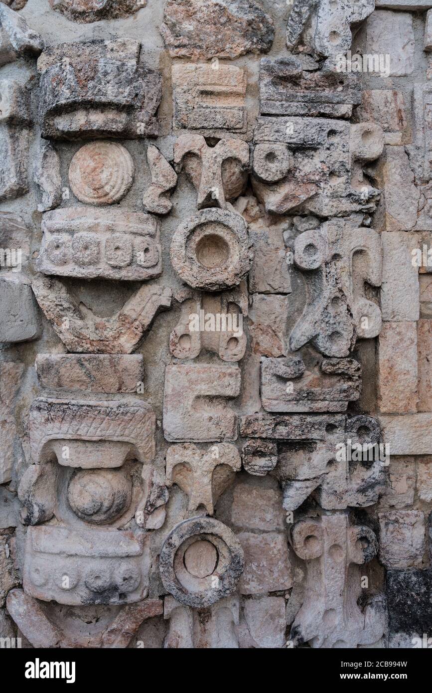 Decorative stone carvings in the Puuc style on the Temple of the Macaw ...