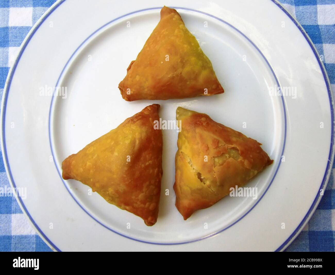 Greek Cuisine. Triangle Shaped Kalitsounia Pies with Spinach and Cheese ...