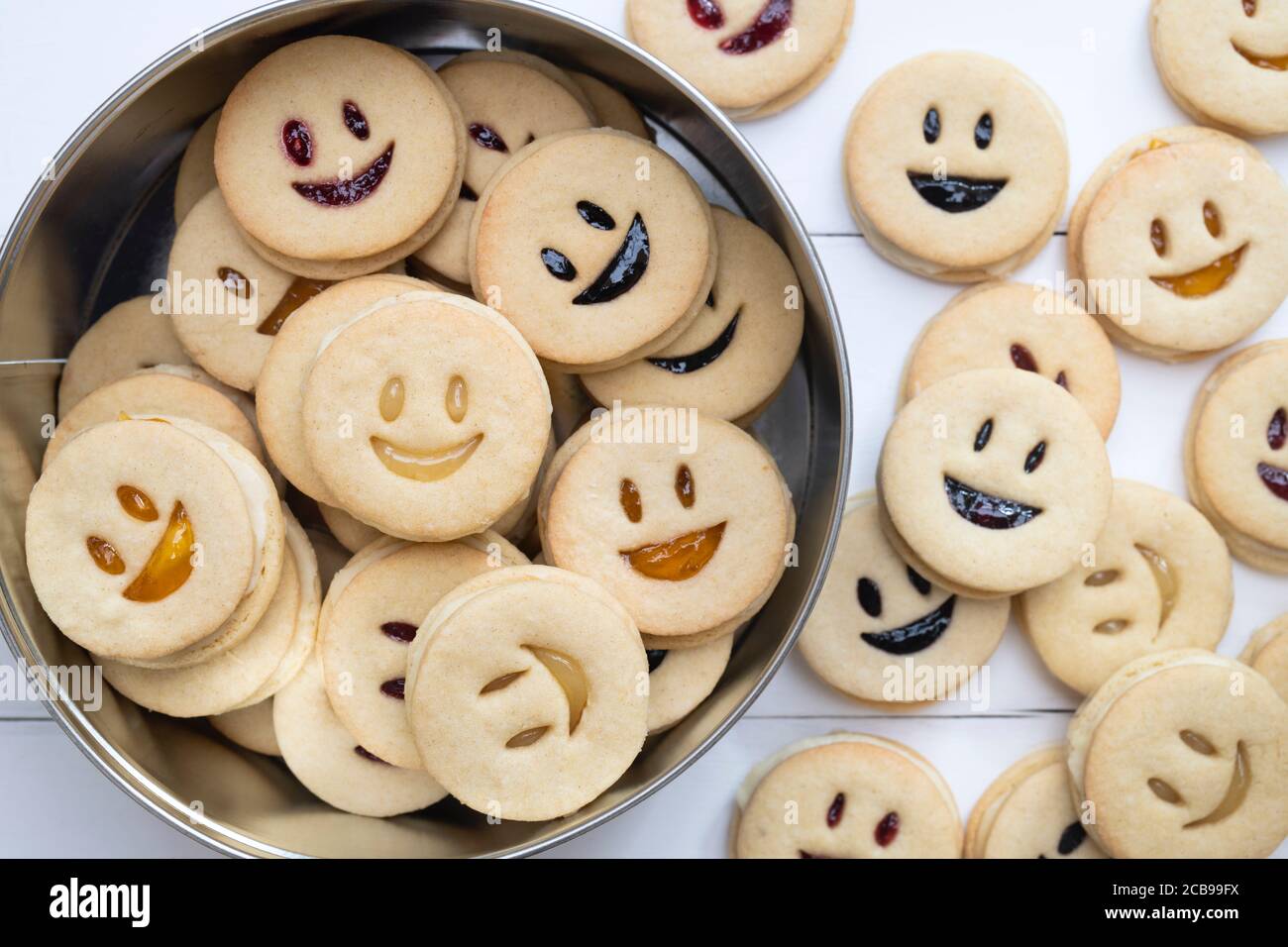 Homemade Jammie Dodgers. Smiling face biscuits Stock Photo - Alamy