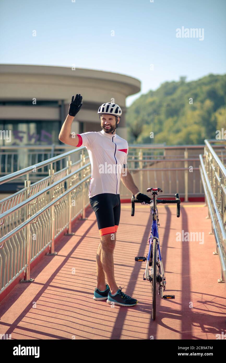 Smiling cyclist hi-res stock photography and images - Alamy