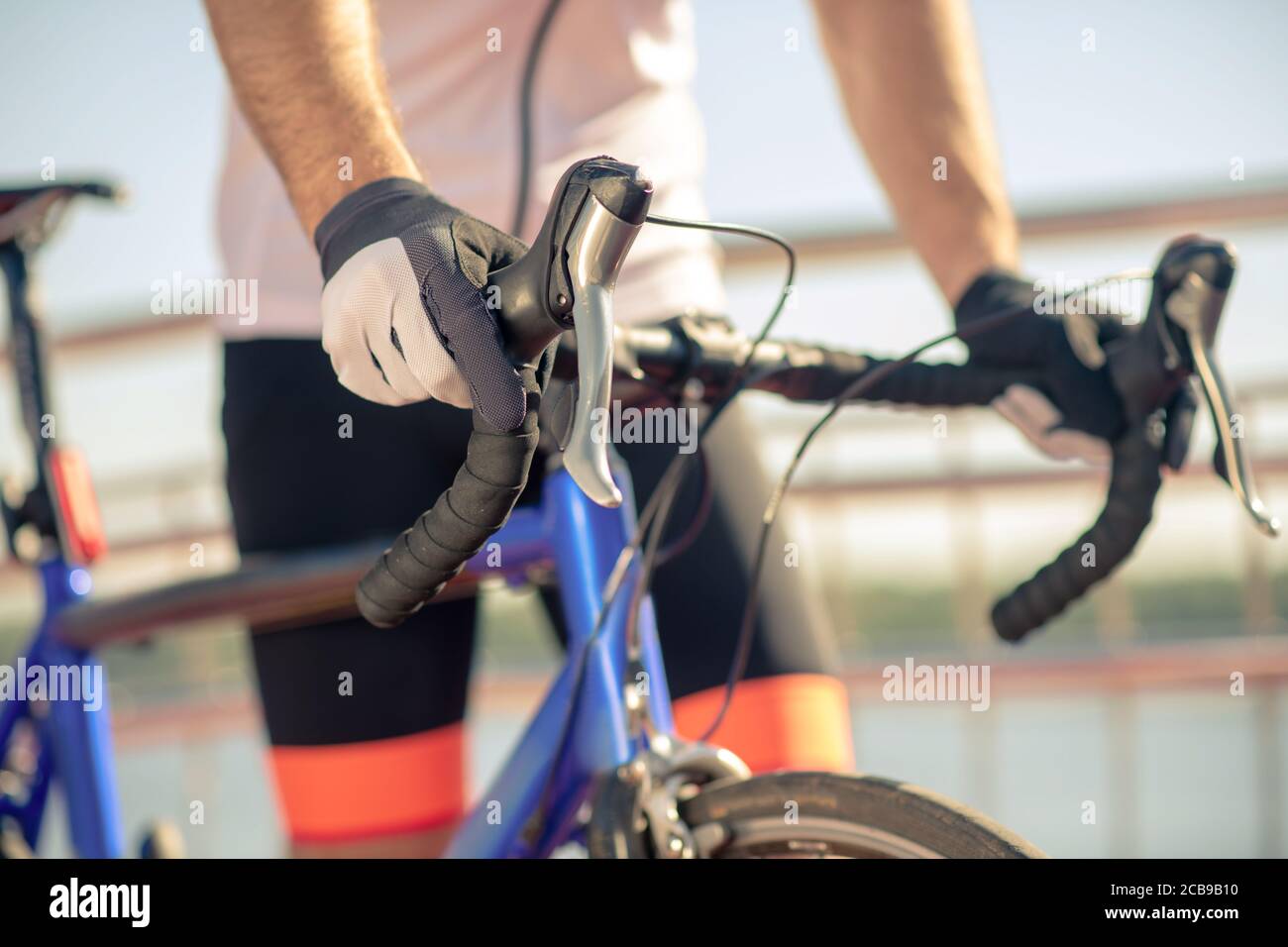 Hands holding handlebar bicycle hi-res stock photography and images - Alamy