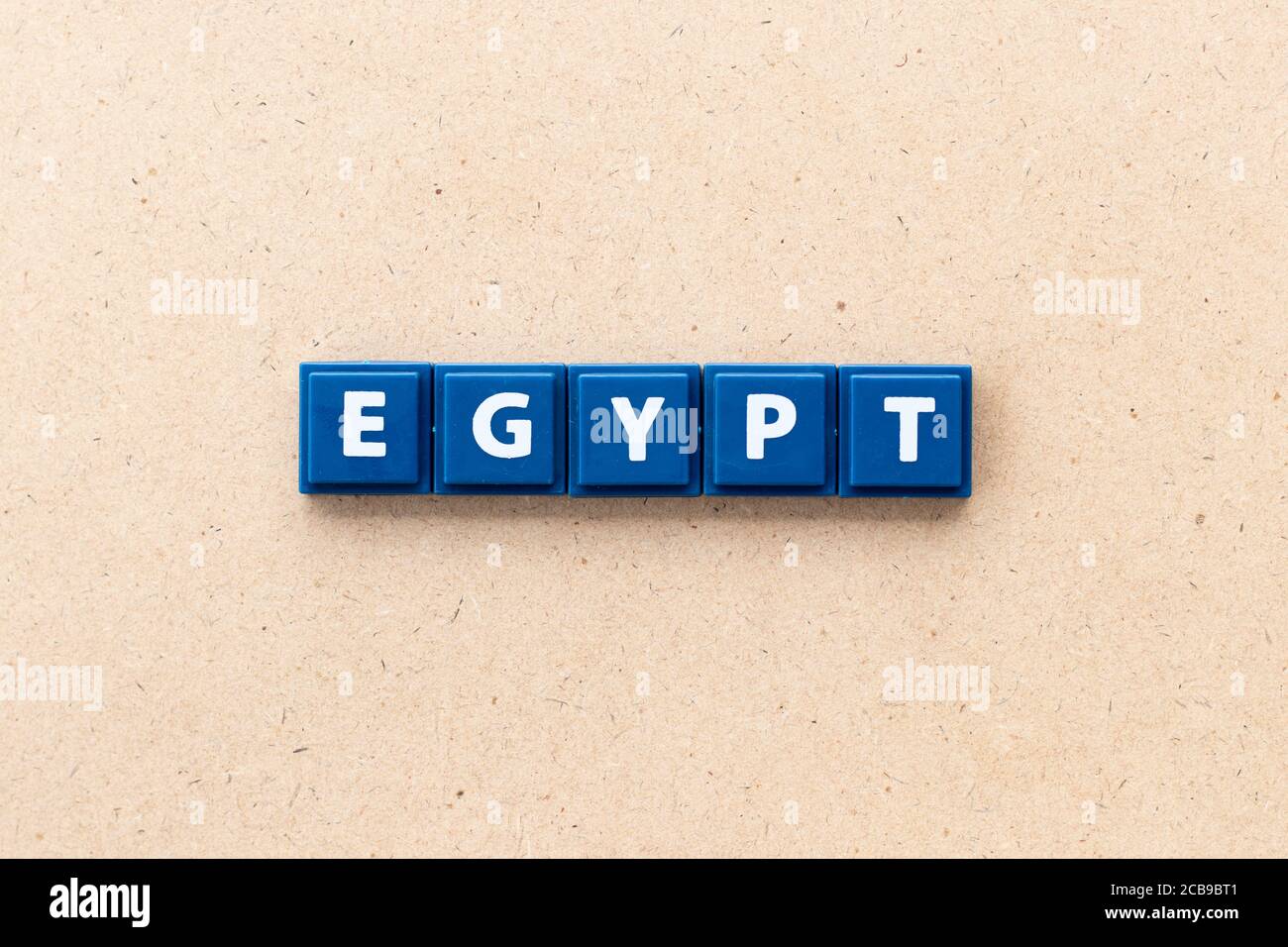 Tile letter in word egypt on wood background Stock Photo - Alamy