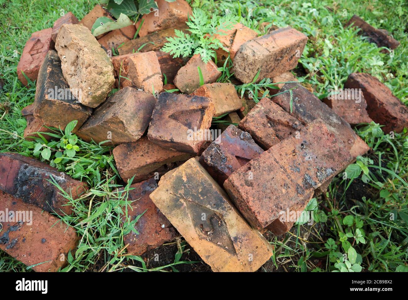 Broken building bricks Stock Photo - Alamy