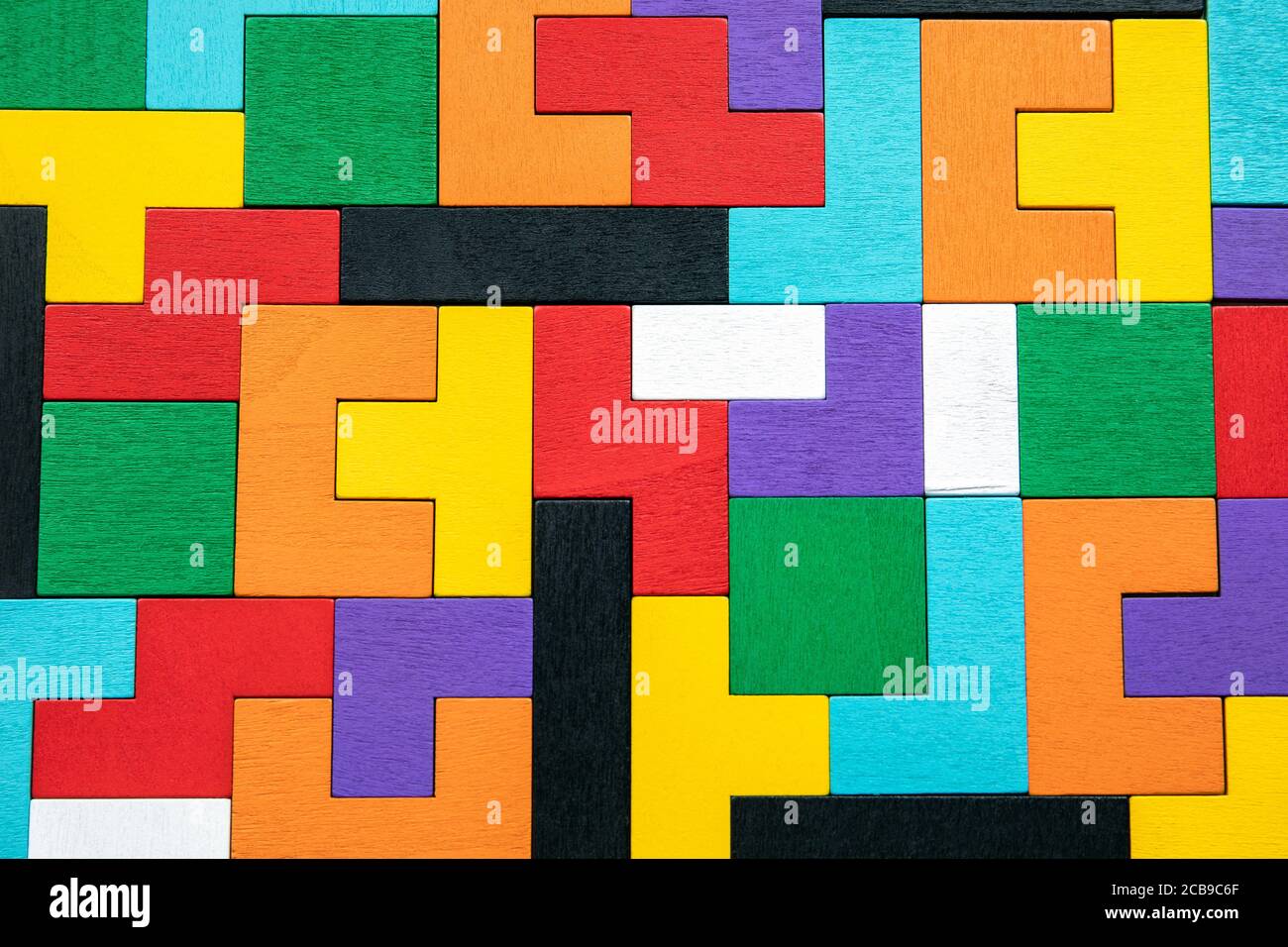 Colored wooden blocks. Puzzle, mind game and toy. Abstract background ...