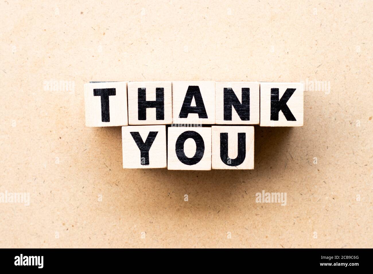 Letter block in word thank you on wood background Stock Photo - Alamy