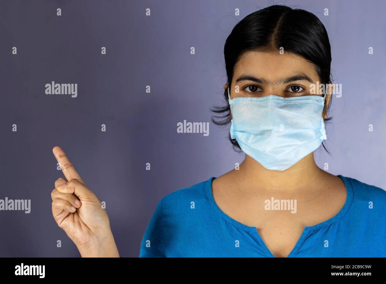 Girl Pointing At Nose High Resolution Stock Photography and Images - Alamy