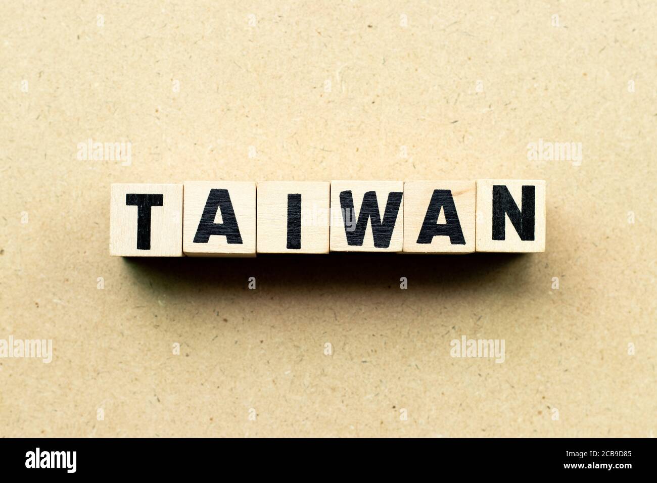 Letter block in word Taiwan on wood background Stock Photo - Alamy