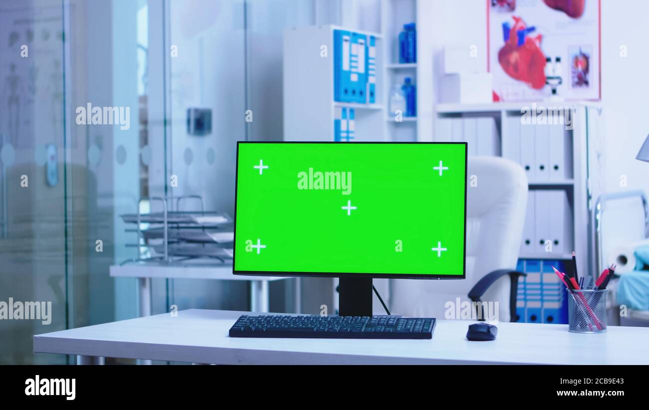 Replaceable computer display in hospital and doctor arriving in health ...