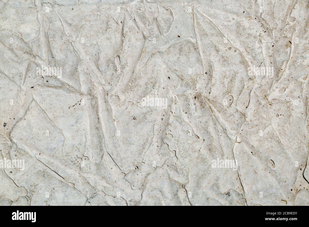 Concrete wall texture with an uneven layer of putty. Textured ...