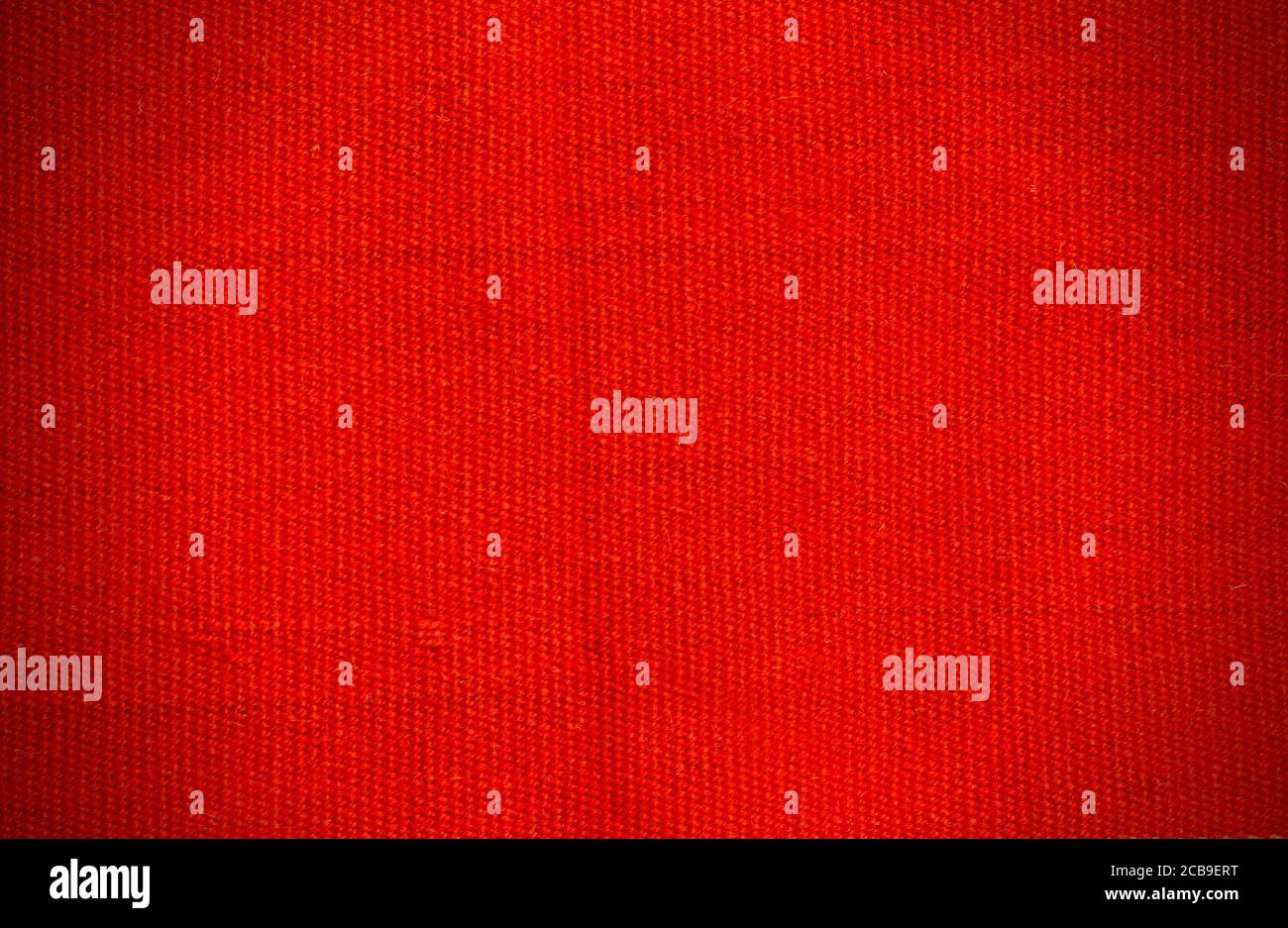 Natural red background of thick fabric. Fabric texture Stock Photo - Alamy