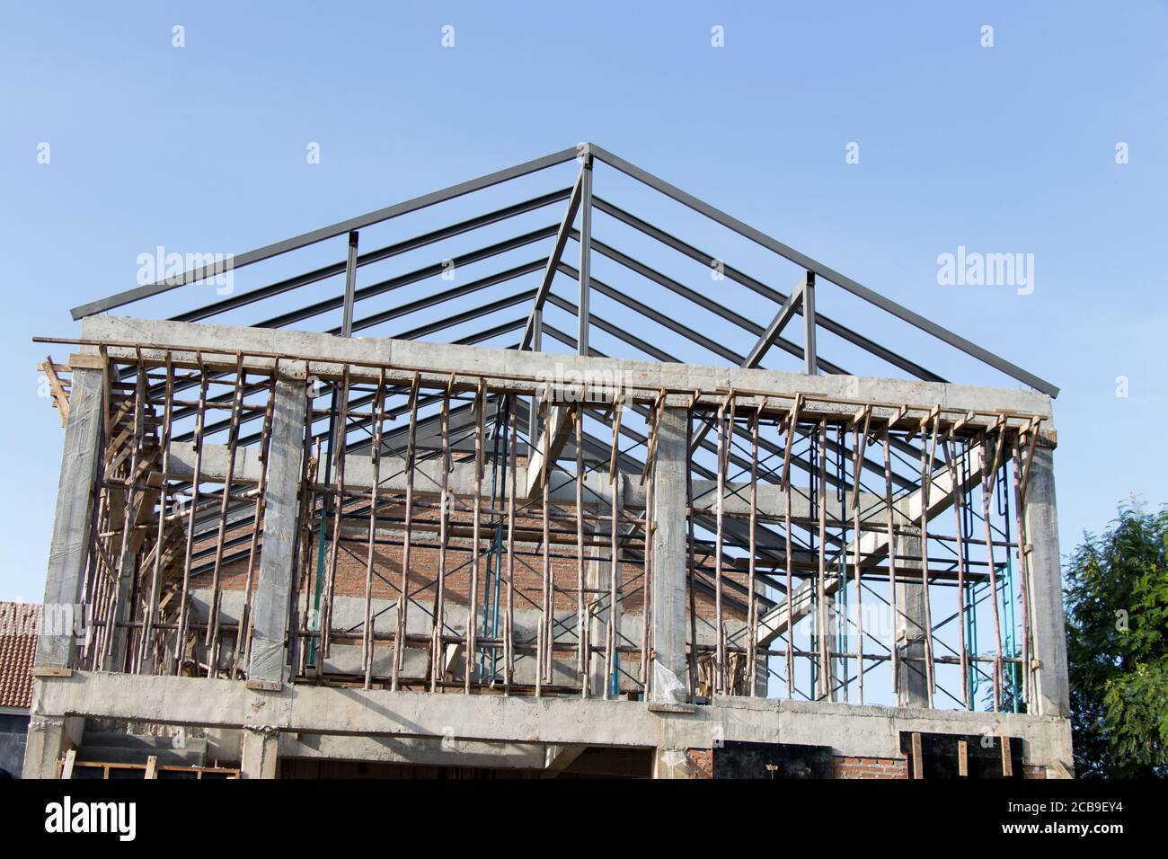 Structure of house wait for complete builidng with blue sky background ...