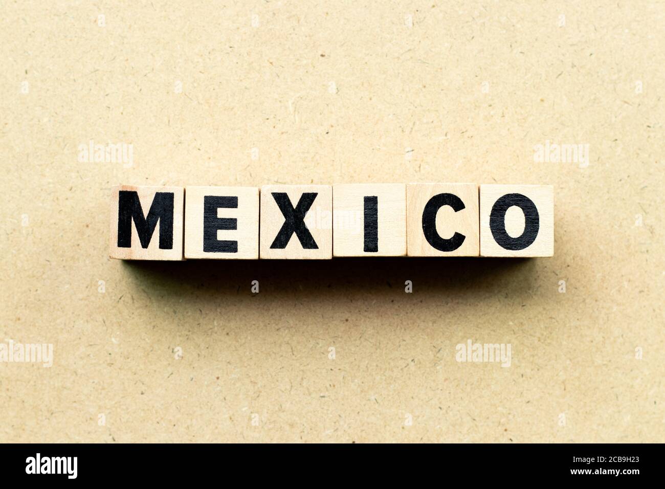 Letter block in word Mexico on wood background Stock Photo - Alamy