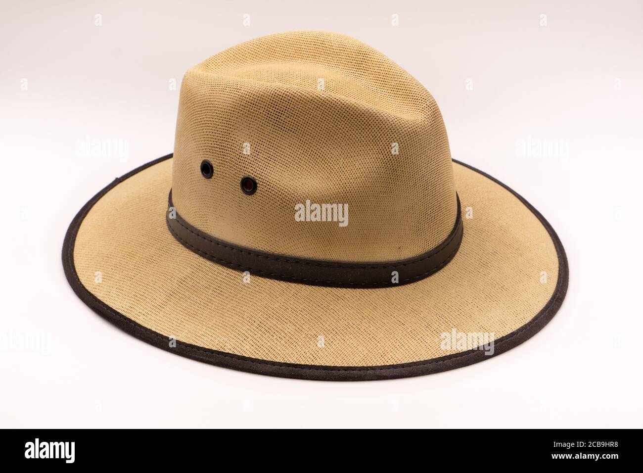 Light brown-colored hat captured with a white background Stock Photo ...