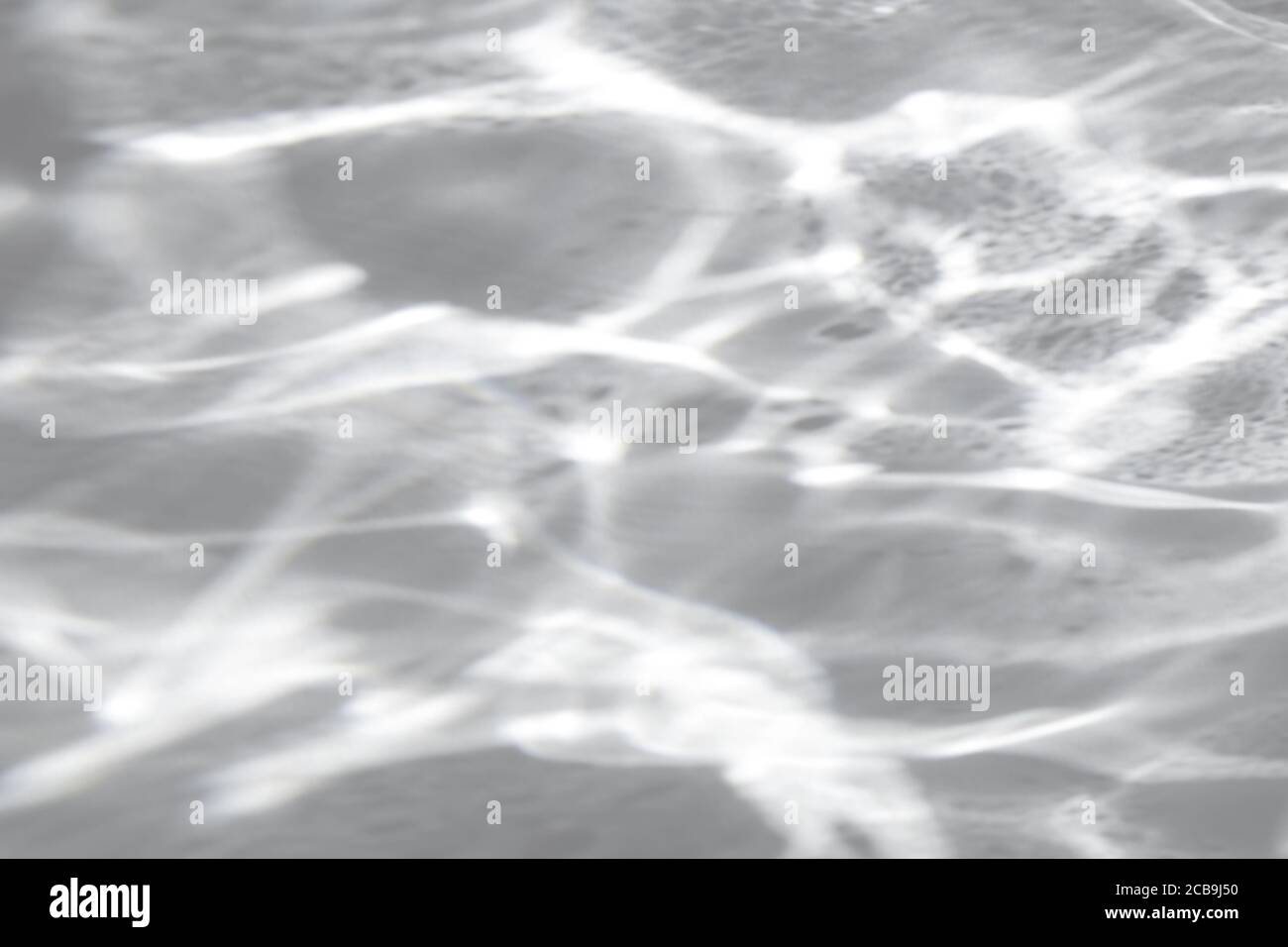 shadow and light caustic effect on a white wall Stock Photo - Alamy