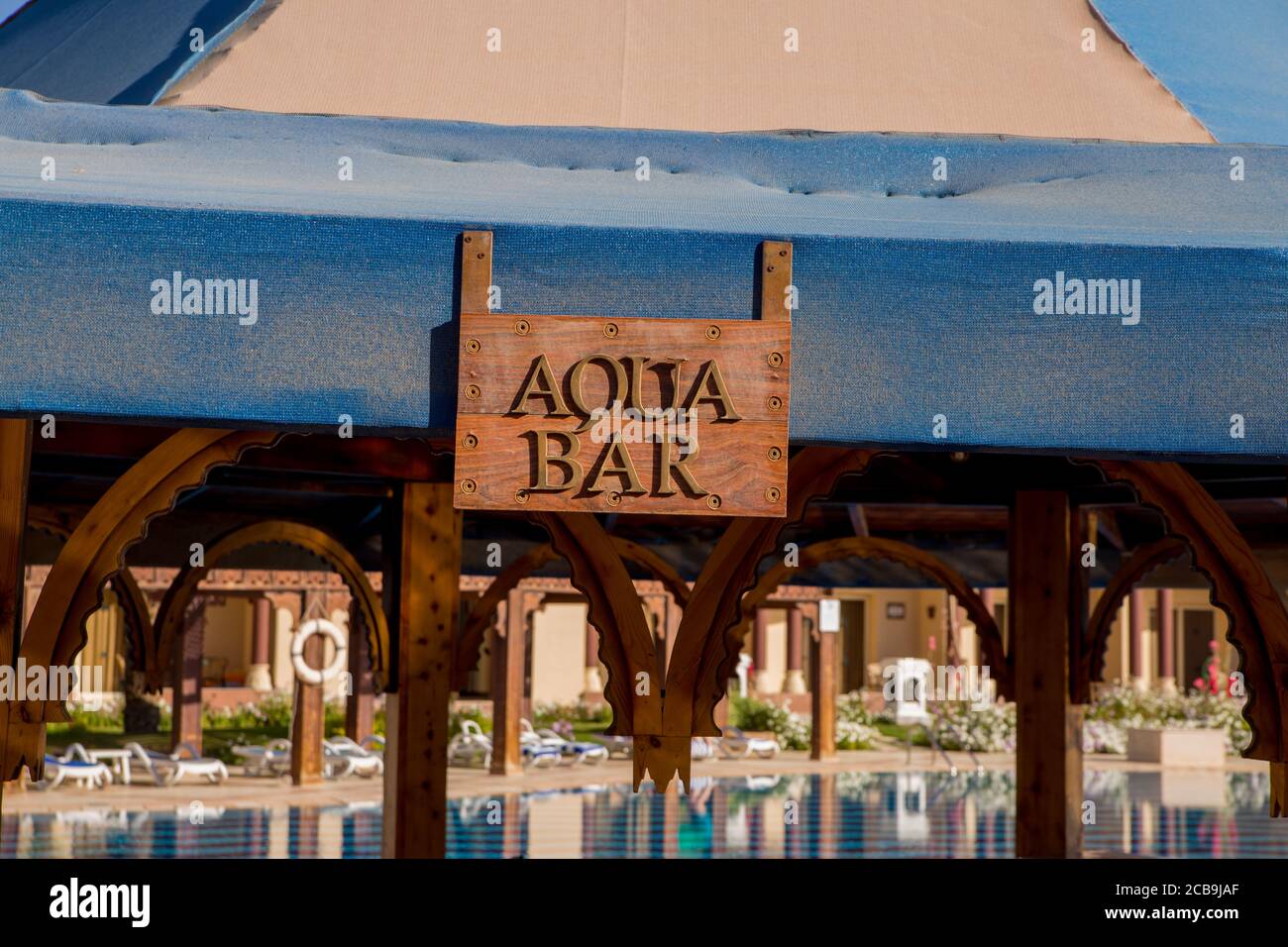 nameplate water bar by pool Stock Photo - Alamy