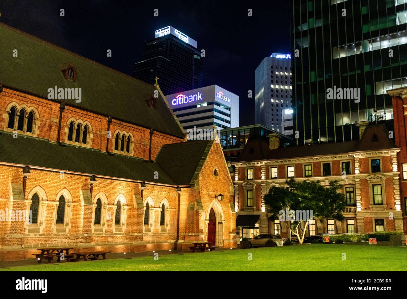 Traditional and modern buildings in the city of Perth at night. Low ...