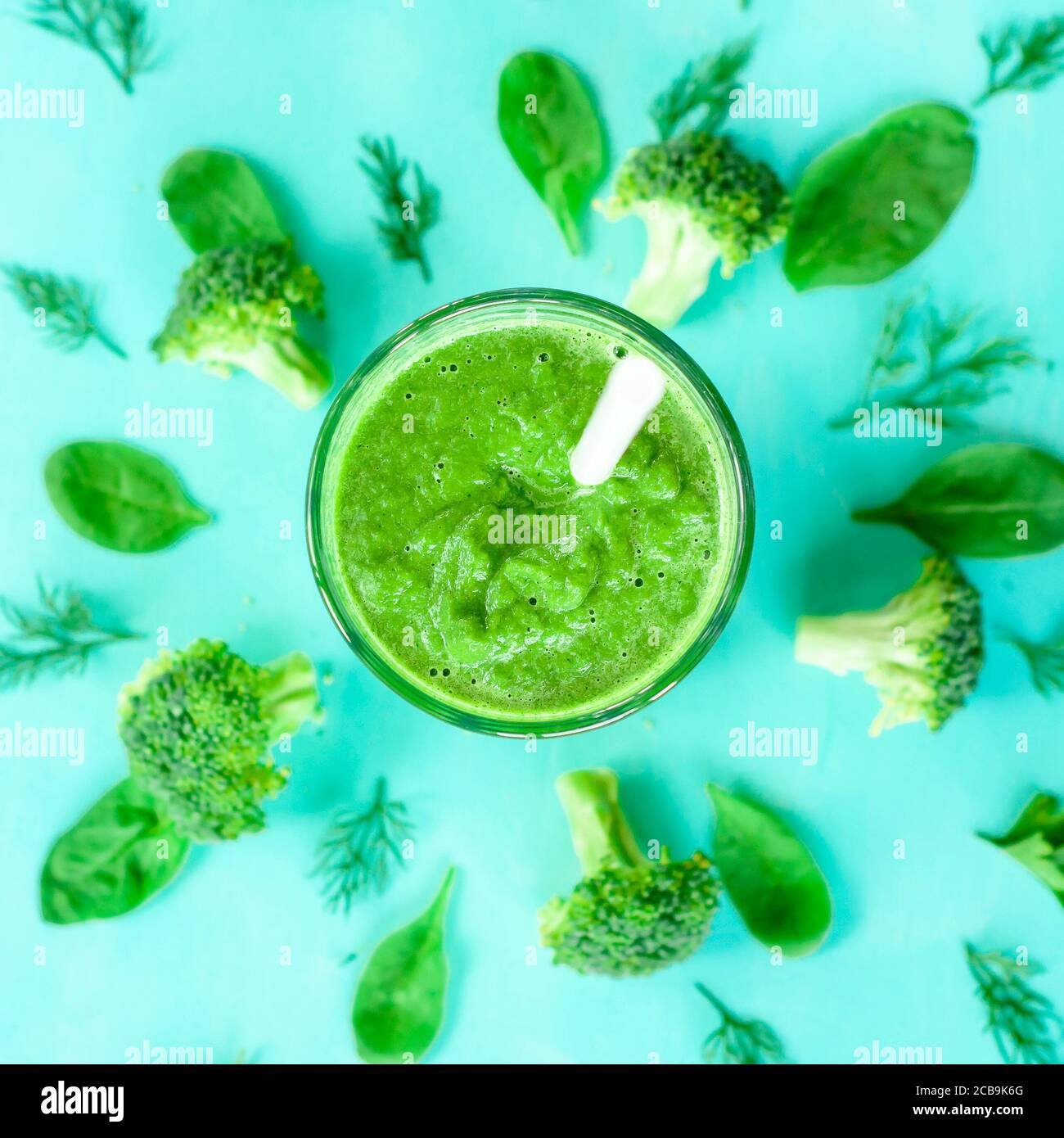 Glass of broccoli juice, on bamboo mat, on green background Stock Photo ...