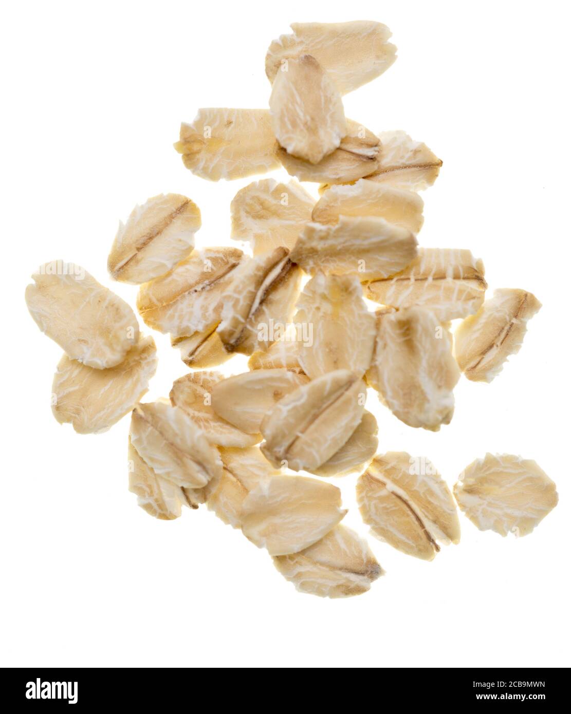 Oat flakes isolated on white background Stock Photo - Alamy