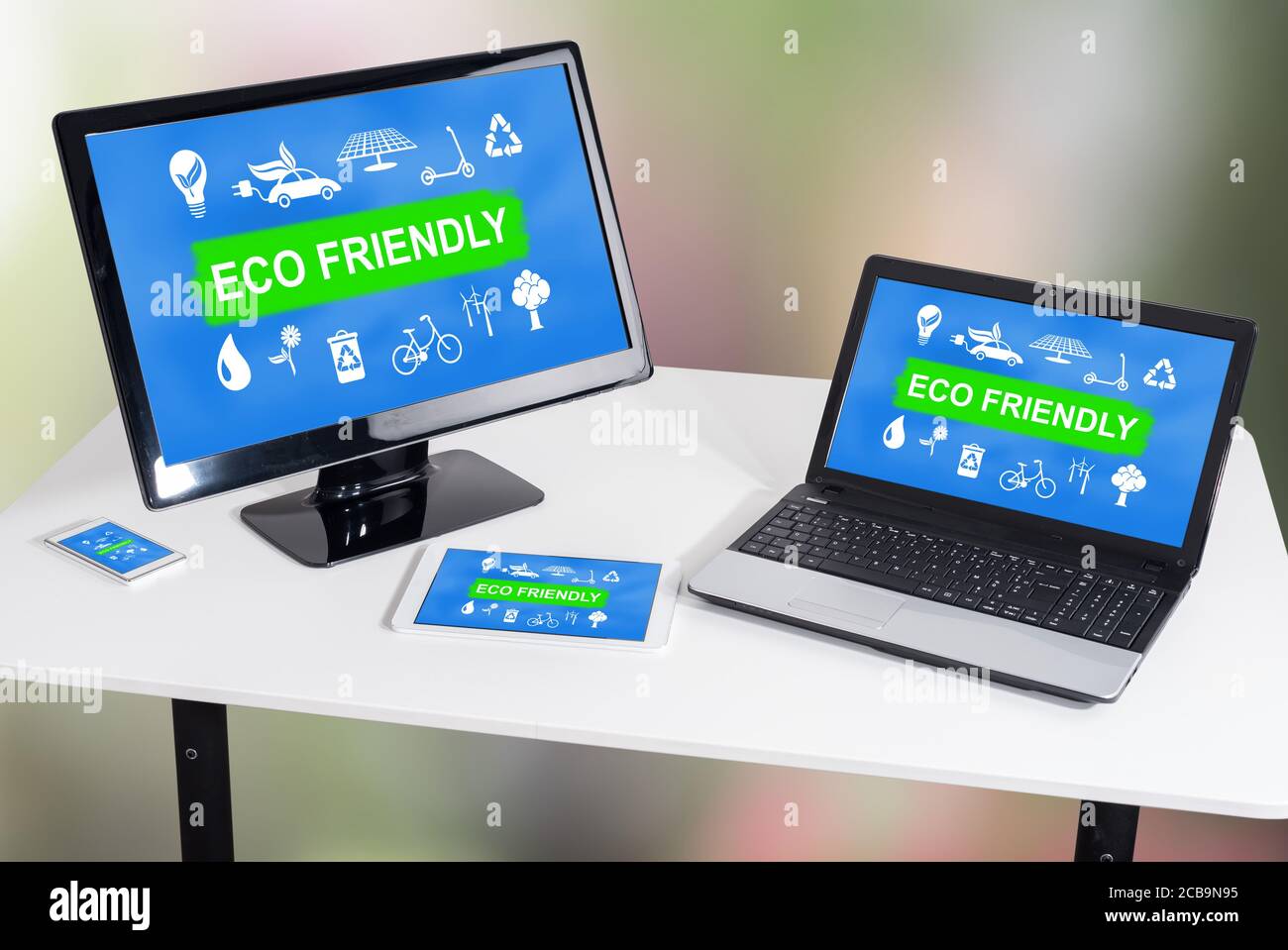 Eco friendly concept shown on different information technology devices ...