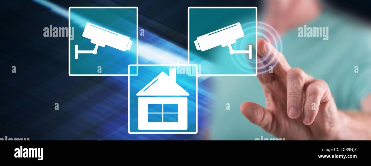 Man touching a security camera concept on a touch screen with his ...