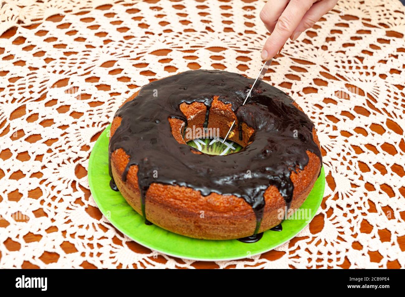 Hand slicing delicious and healthy traditional Brazilian homemade ...