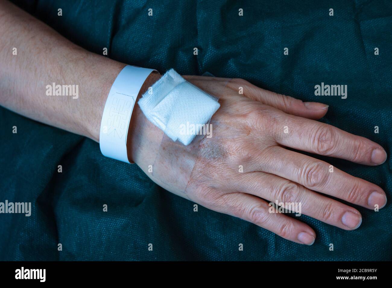Closeup shot of a medical adhesive plaster on male hand Stock Photo - Alamy