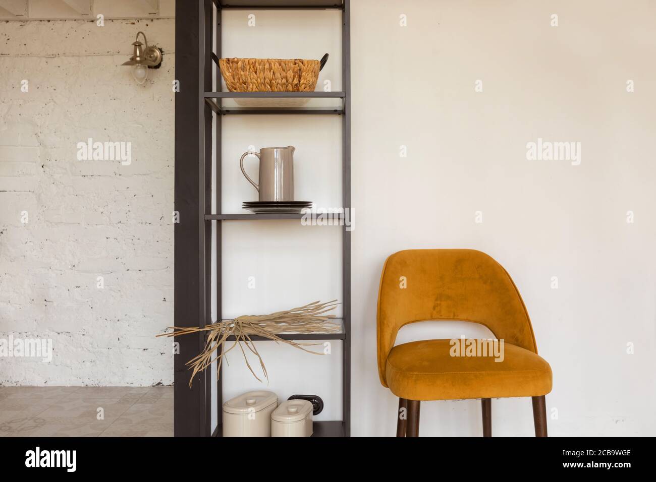 Chair and shelves with decorations Stock Photo - Alamy