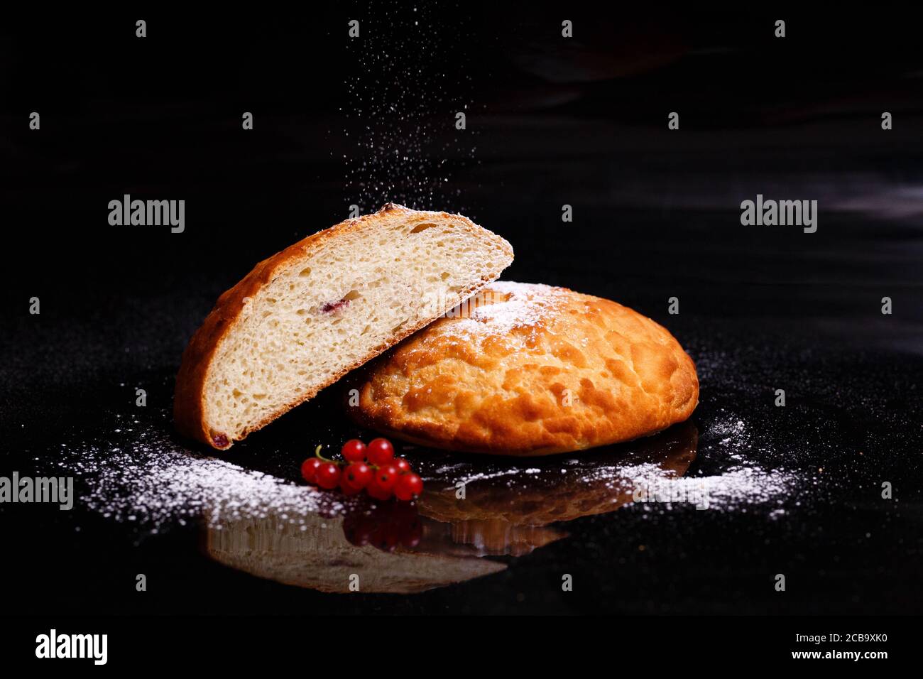 Sweet cupcake in round bread shape with filling. Photo in section Stock ...