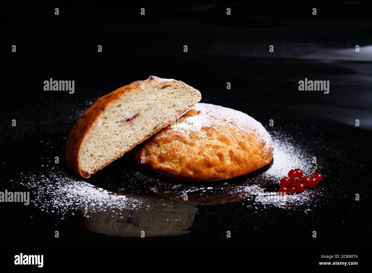 Sweet cupcake in round bread shape with filling. Photo in section Stock ...