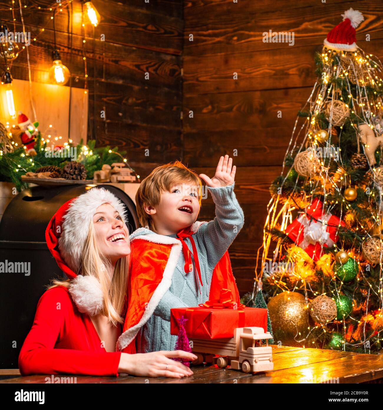 Happy family - Brother and sister celebrate Christmas or New Year ...