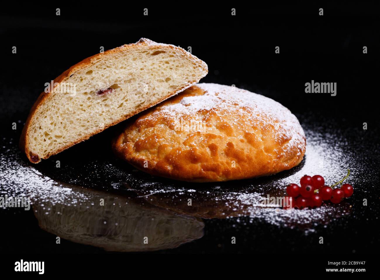 Sweet cupcake in round bread shape with filling. Photo in section Stock ...