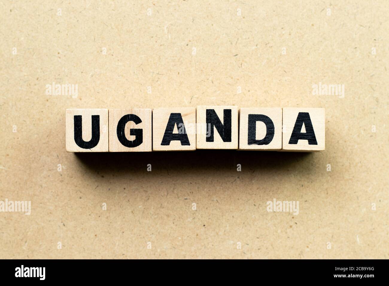 Letter block in word Uganda on wood background Stock Photo - Alamy