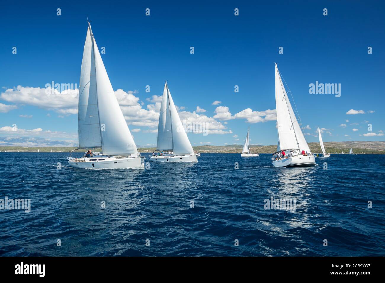 Sailing yachts regatta competition. Summer sport and recreation ...