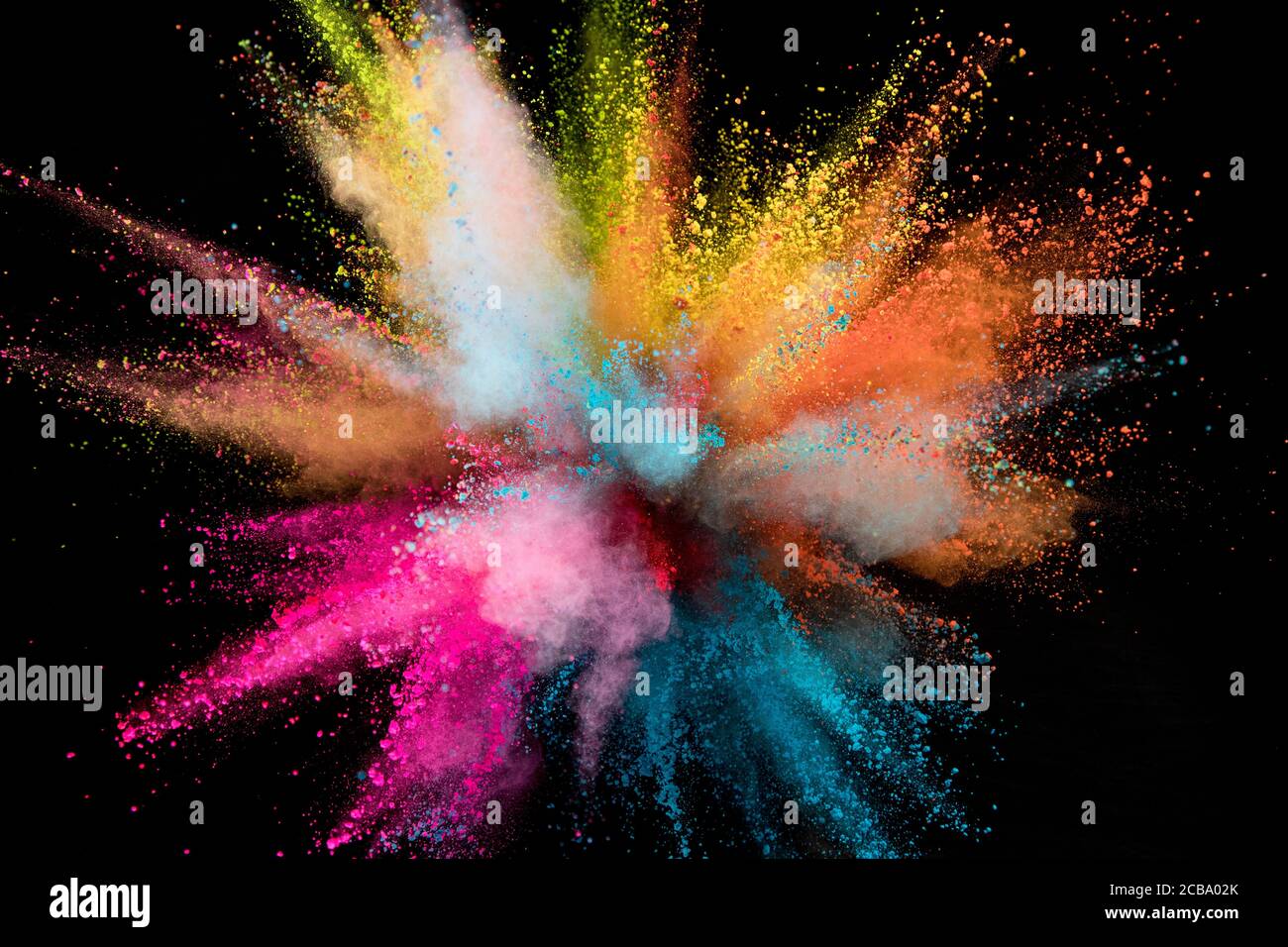 Explosion of colored powder isolated on black background. Abstract colored background Stock ...