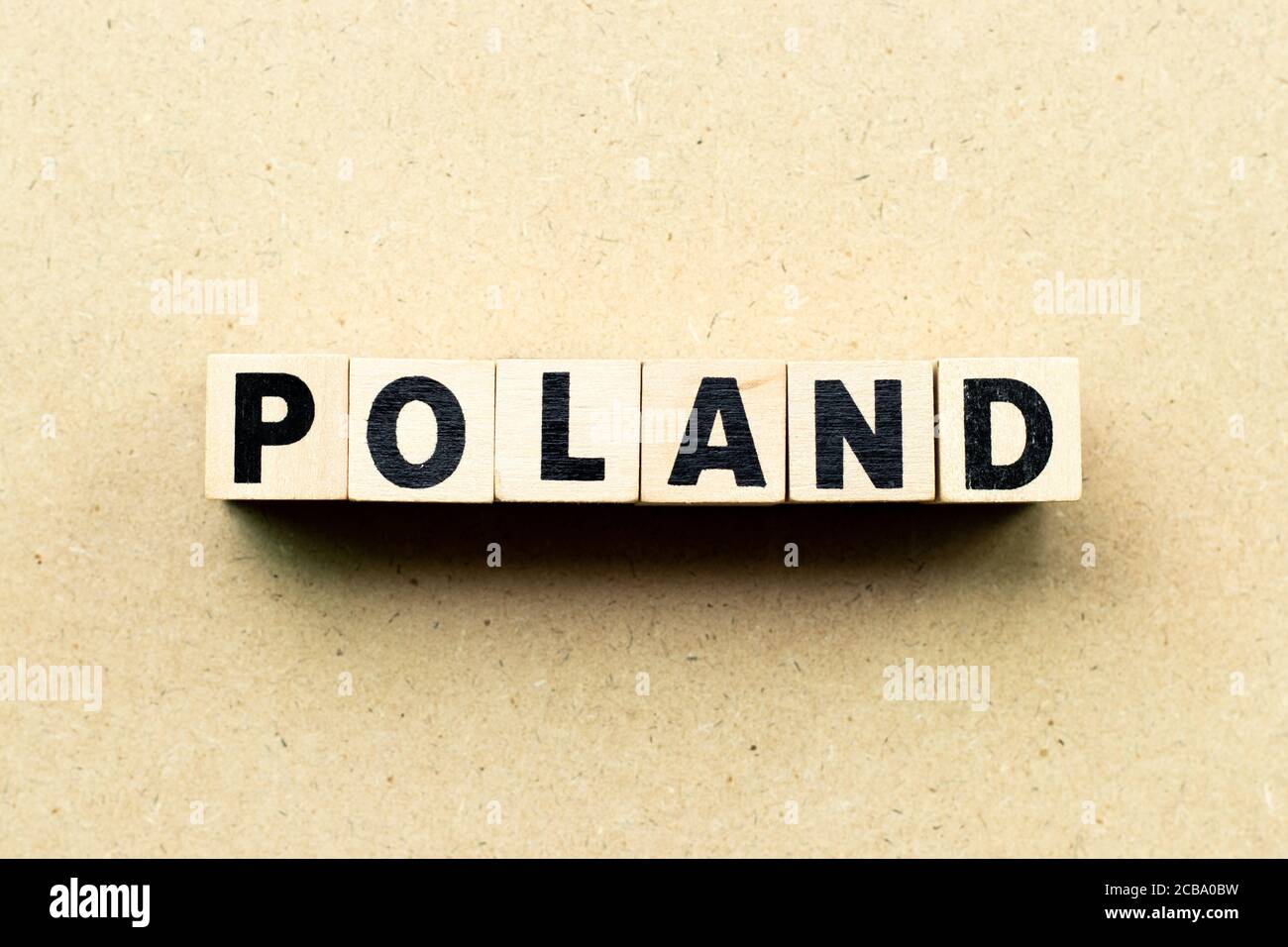 Letter block in word Poland on wood background Stock Photo - Alamy