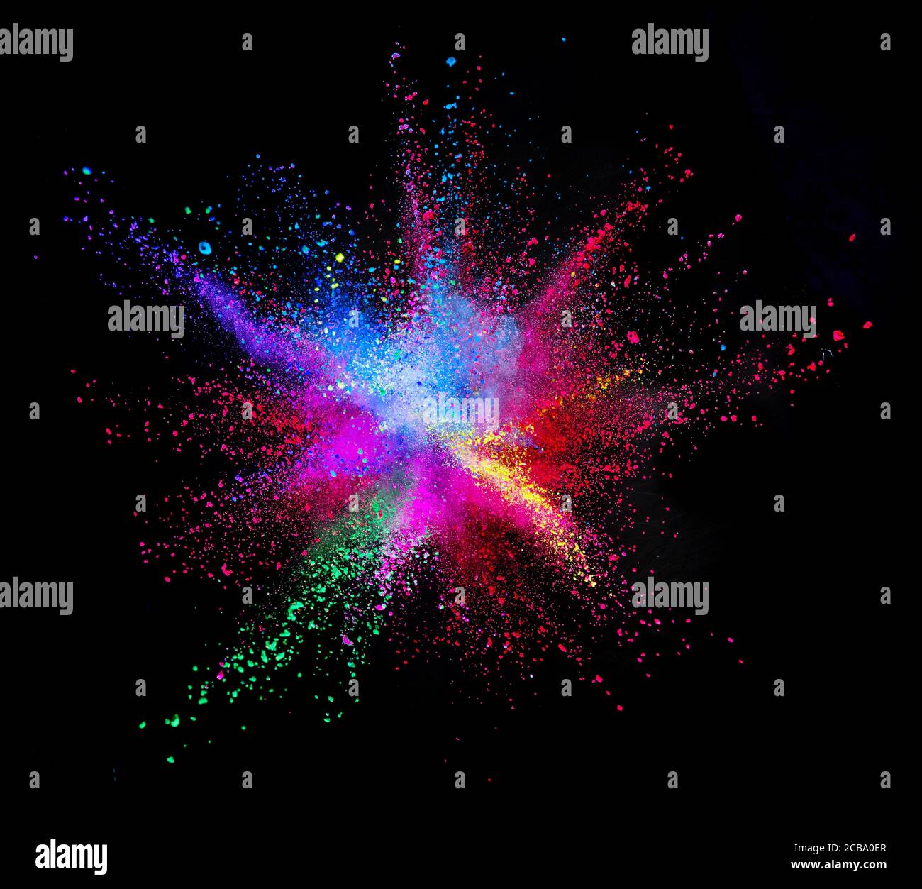 Multi colored powder explosion isolated on black background. Freeze ...