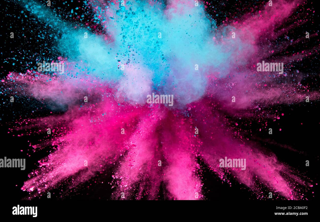 Multi colored powder explosion isolated on black background. Freeze ...