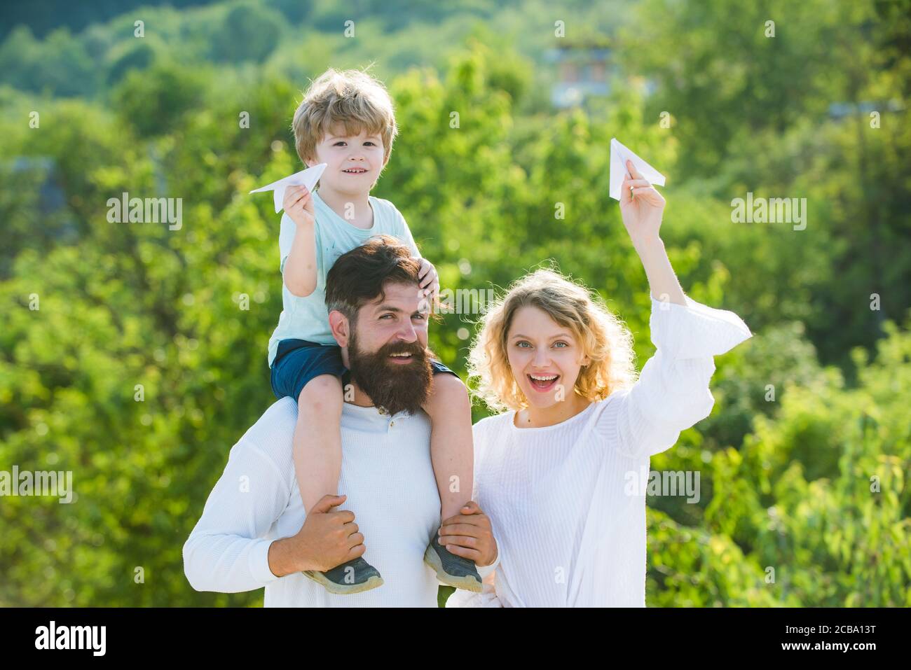 Retro hipster romantic couple in love with happy kid. Freedom to dream ...