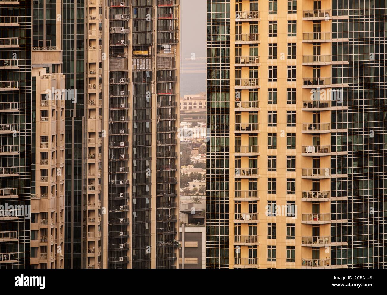 Close up of skyscrapers in Dubai, UAE. Modern city iving in high ...